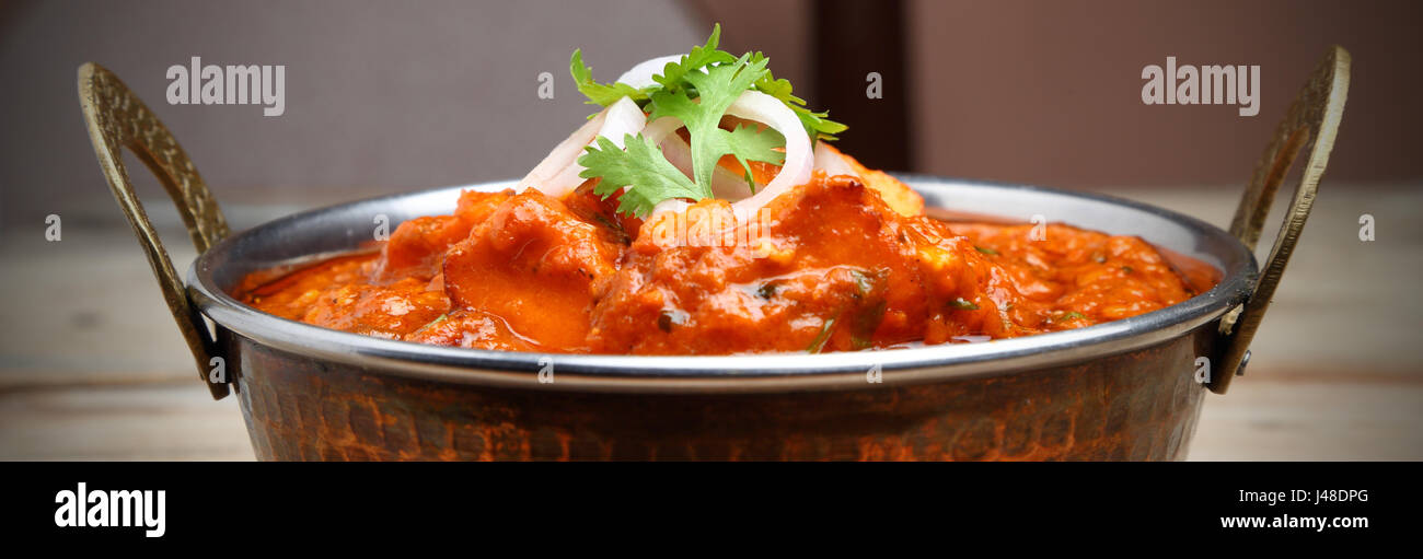 Indian Food or Indian Curry in a copper brass serving bowl Stock Photo ...
