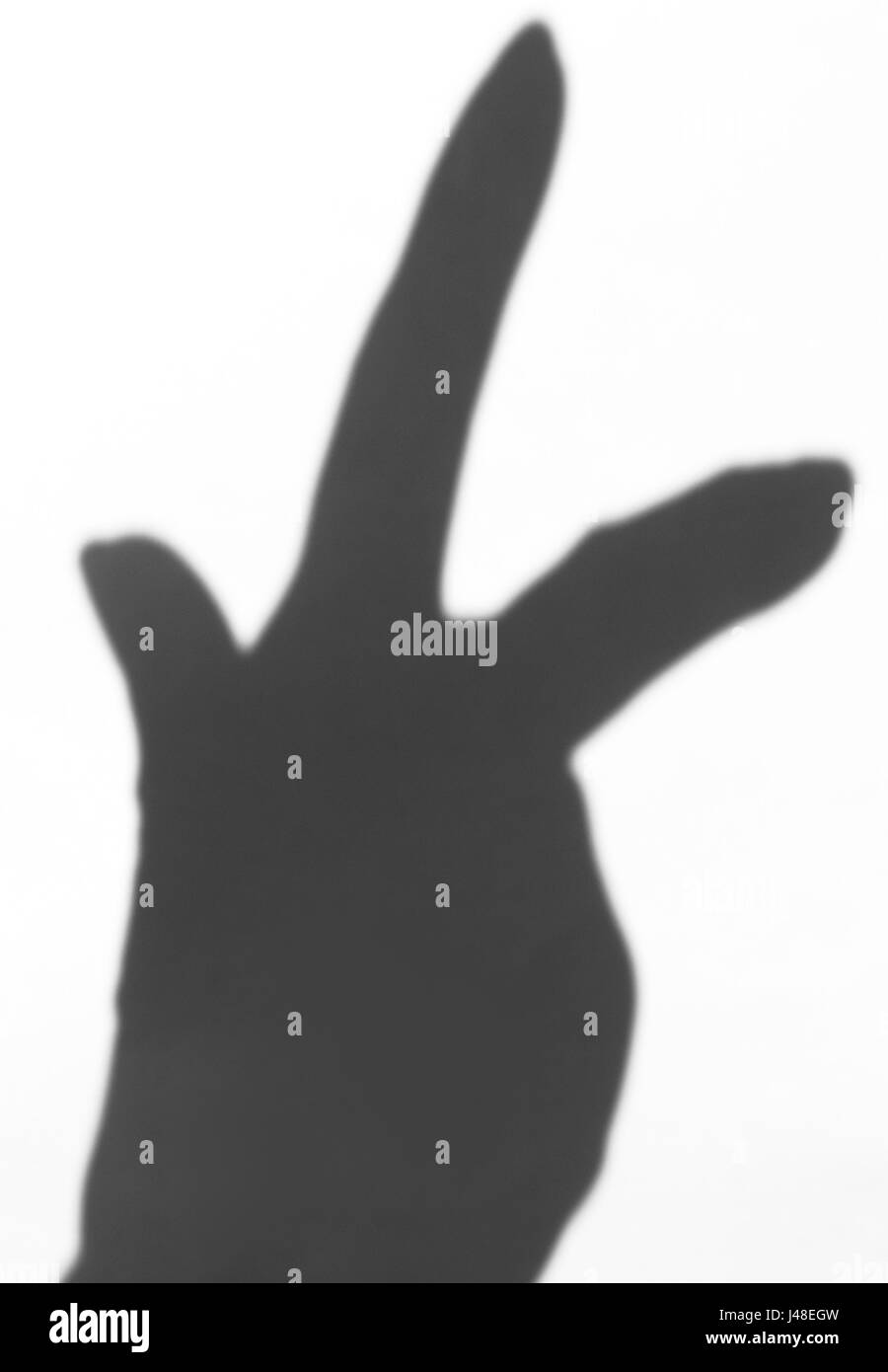 the shadow of the hand white background closeup Stock Photo - Alamy
