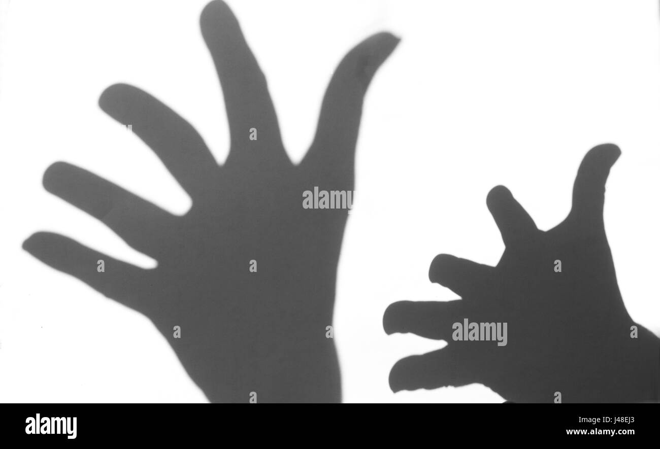 the shadow of the hand white background closeup Stock Photo - Alamy