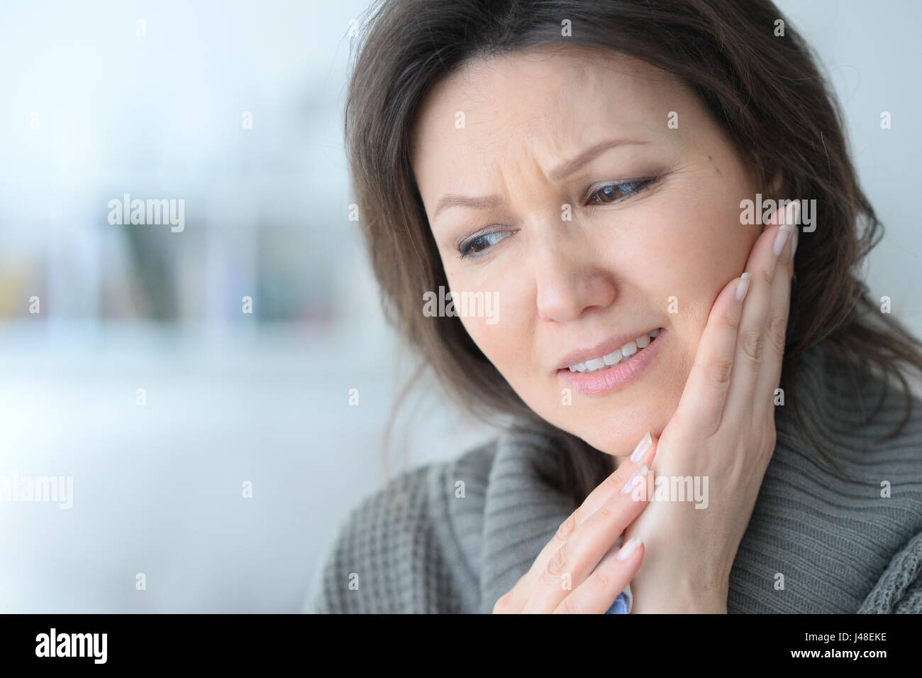 Young woman with toothache Stock Photo - Alamy