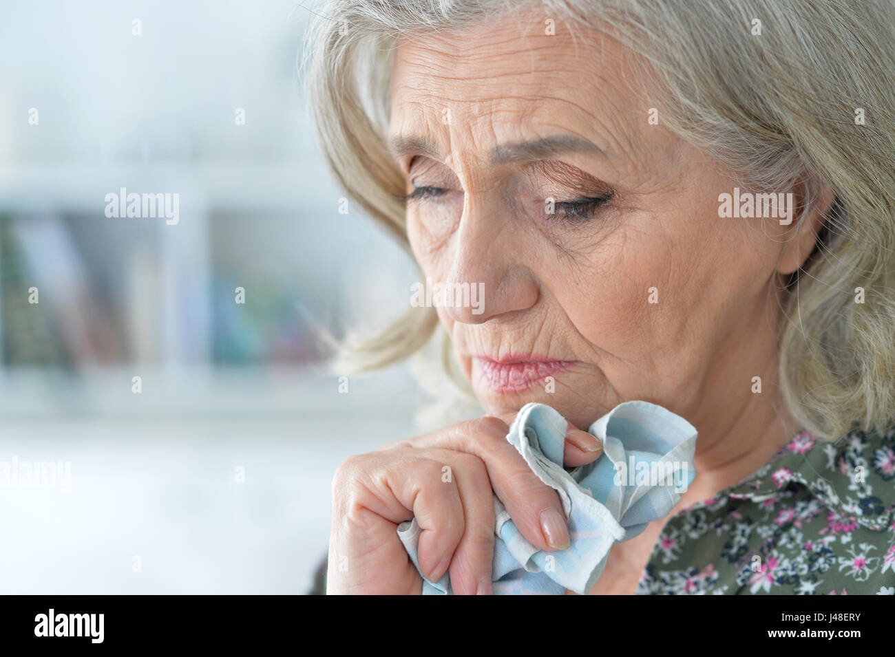 Beautiful sad elderly woman Stock Photo - Alamy