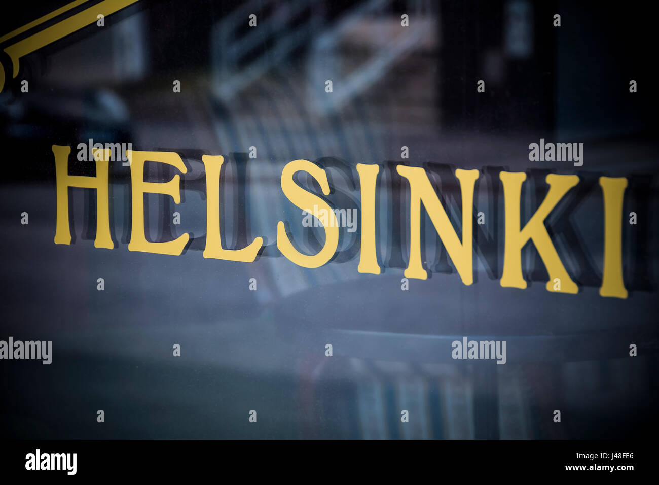 Helsinki golden sign in window in the Finnish capita Stock Photo - Alamy