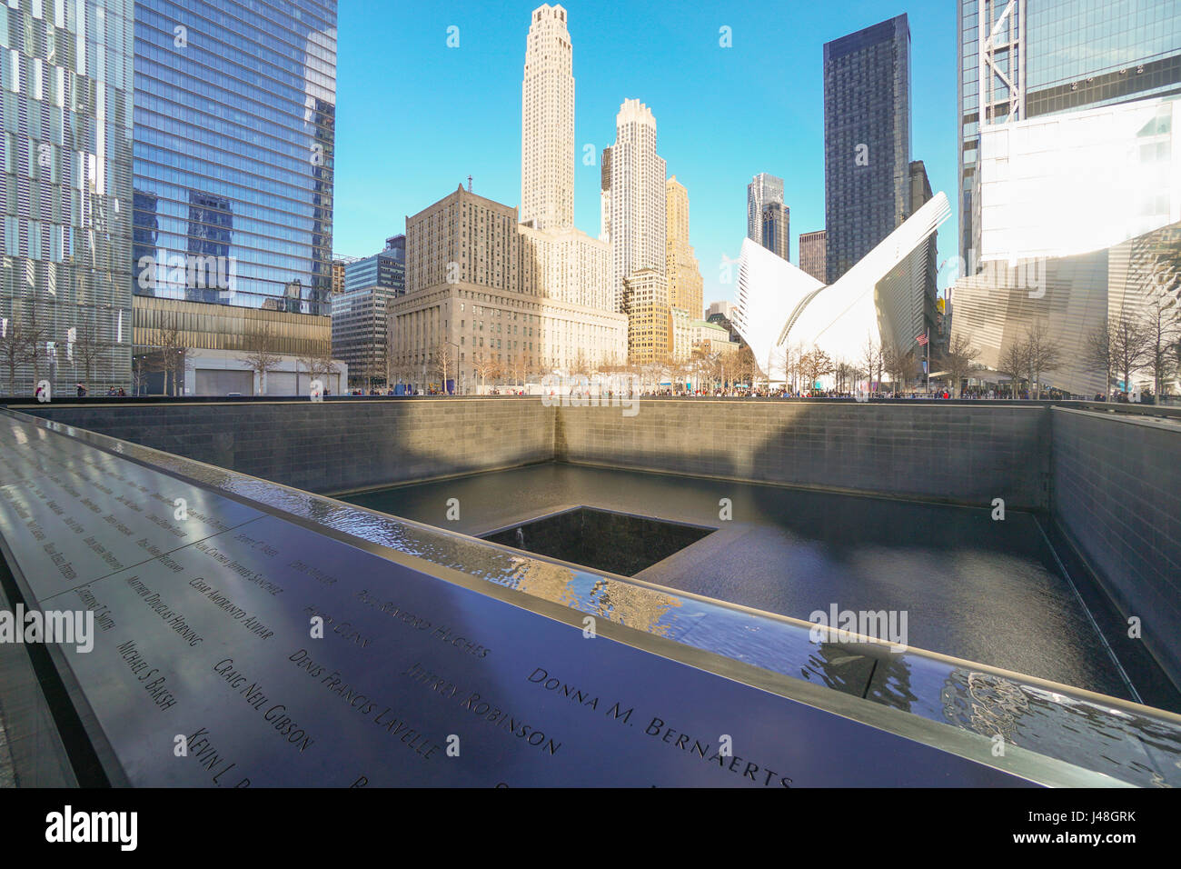 Engraved names of the victims of 9/11 at Ground Zero Memorial ...