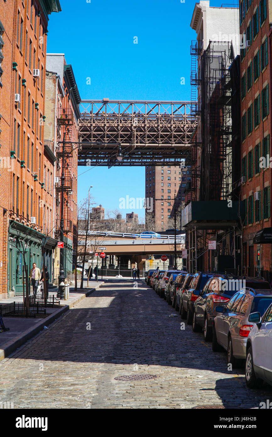 Street canyon with Brooklyn Bridge in Downtown Manhattan- MANHATTAN ...