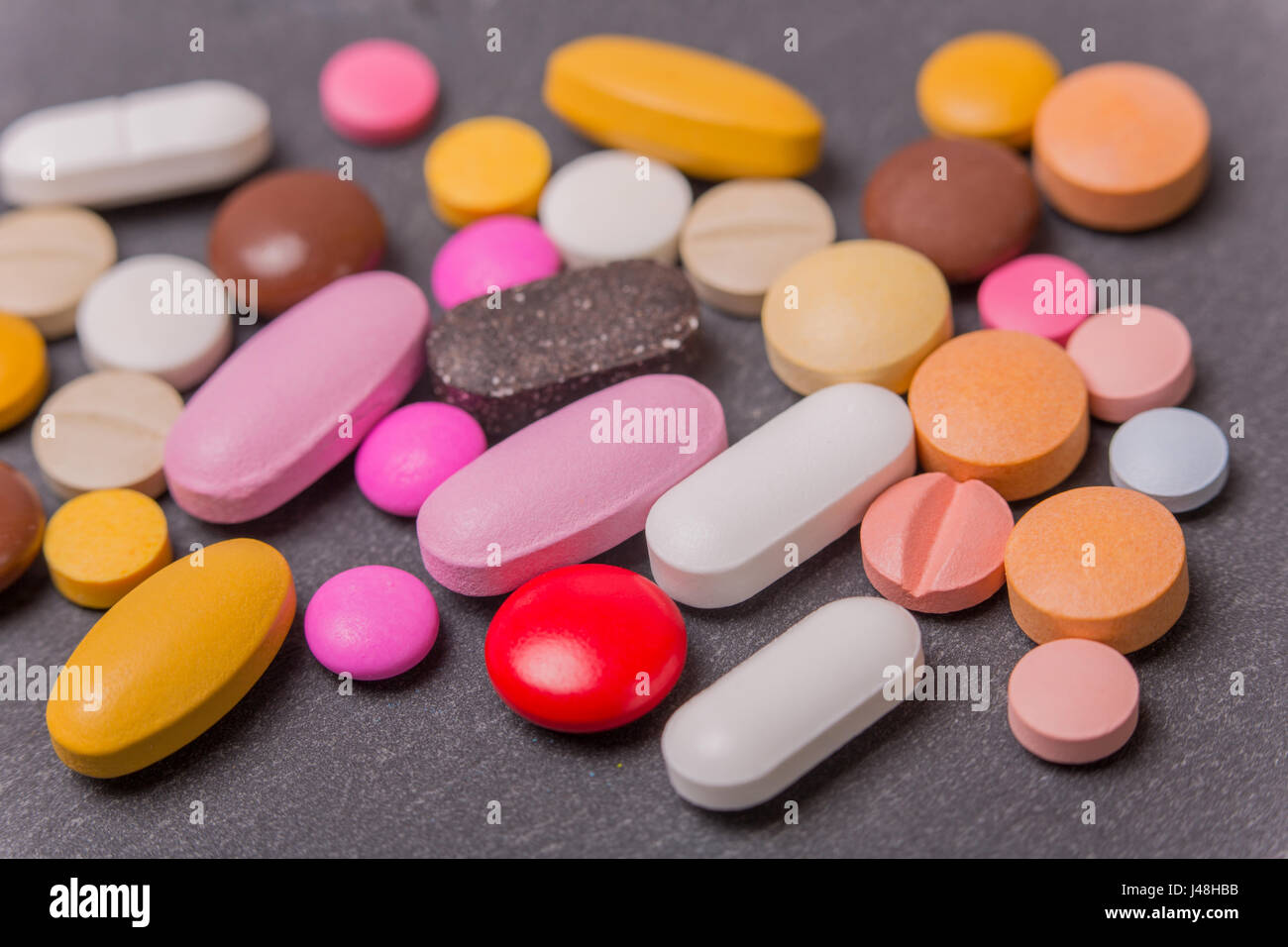 different Tablets pills capsule heap mix therapy drugs Stock Photo - Alamy