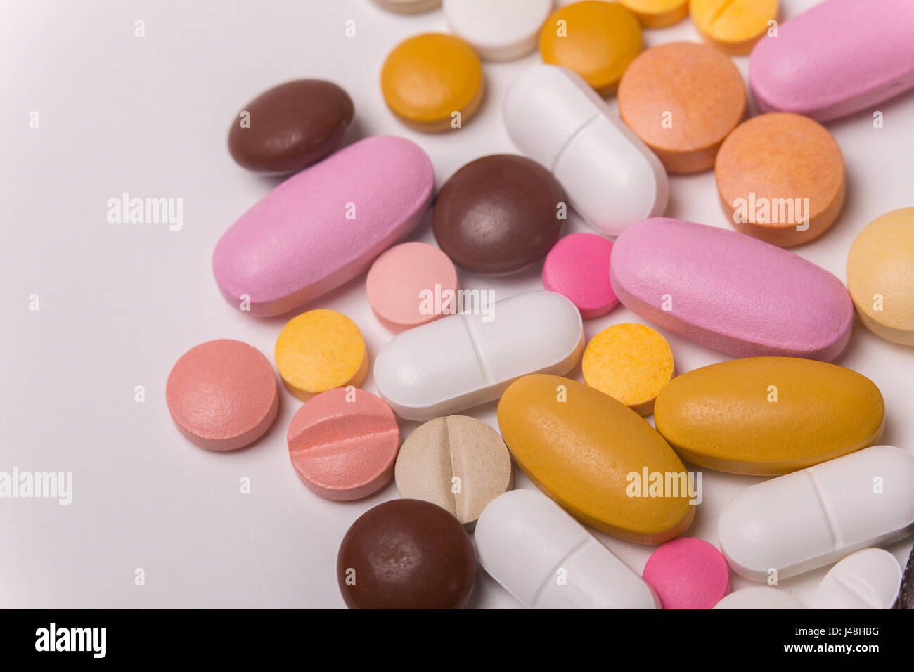 different Tablets pills capsule heap mix therapy drugs Stock Photo - Alamy