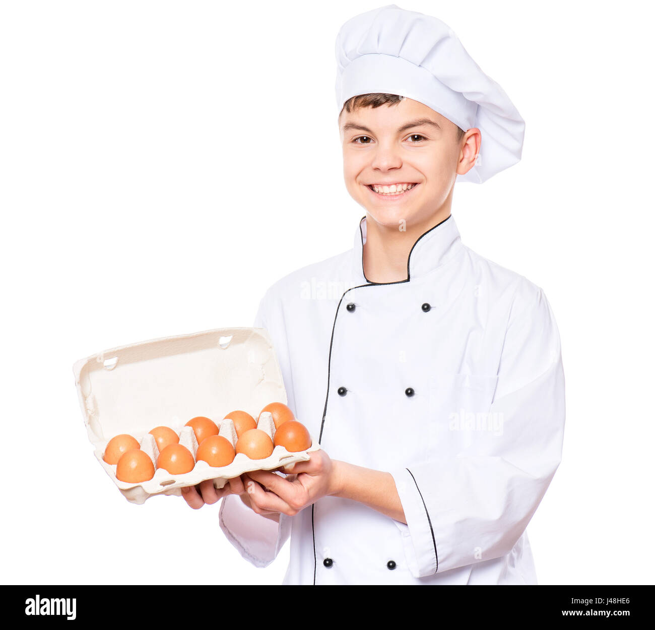 Teen boy wearing chef uniform Stock Photo - Alamy