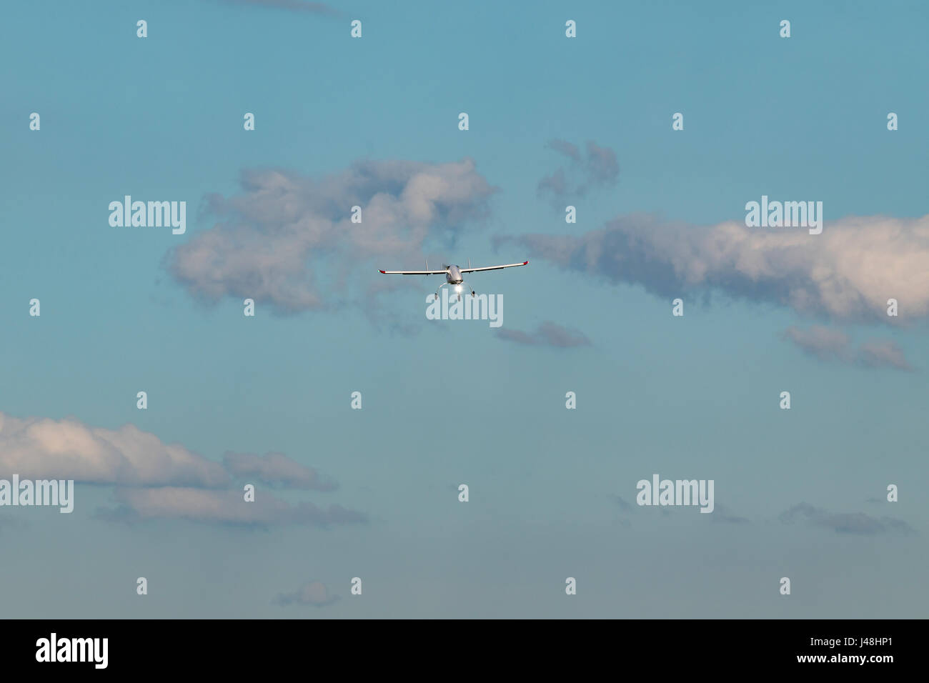 Unmanned aerial vehicle (UAV) in blue sky Stock Photo - Alamy