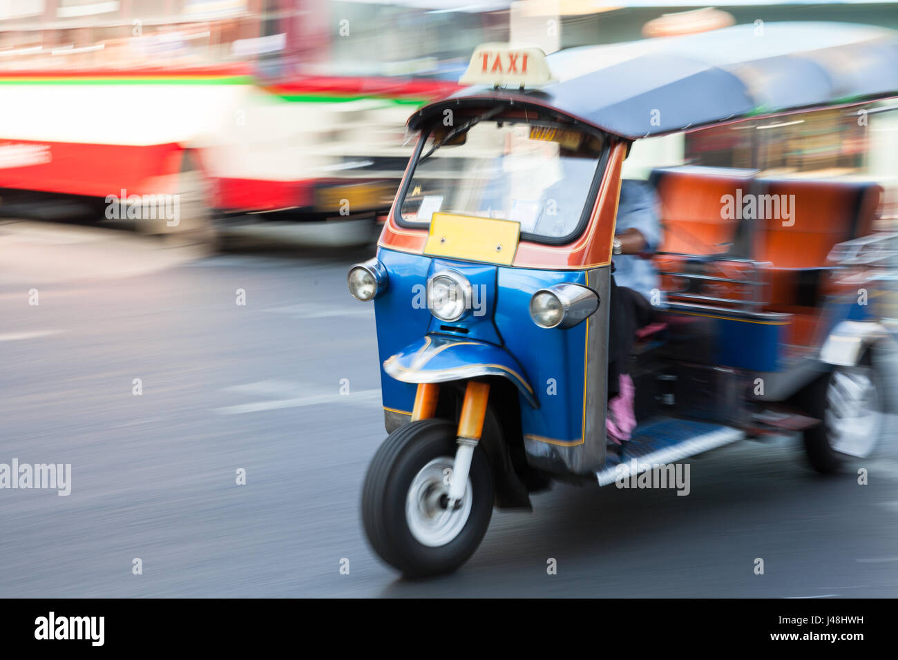 Man riding tuk-tuk on the street of Bangkok, Thailand Stock Photo - Alamy