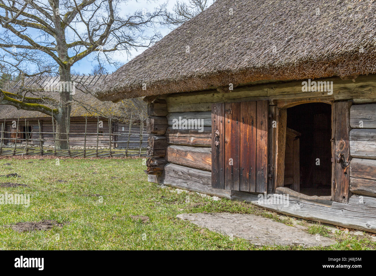 Old log barn with a thatched roof. Tallinn open-air museum ,Estonia ...