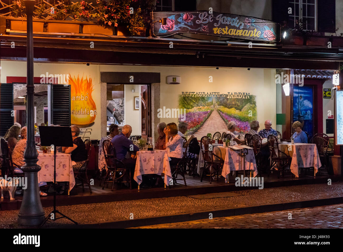Open air restaurants at night in the Old Town of Funchal, Madeira Stock ...