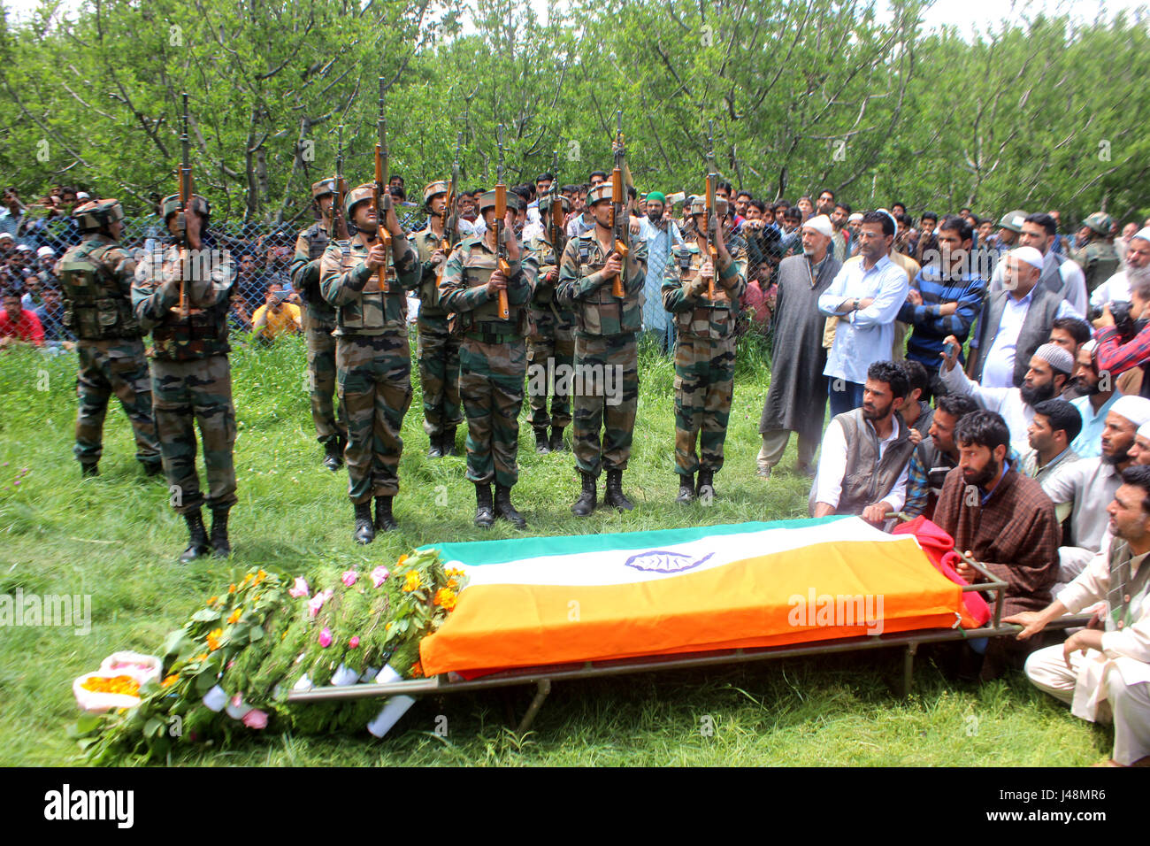 An Indian army cover coffin with Indian flag during wreath lying ...