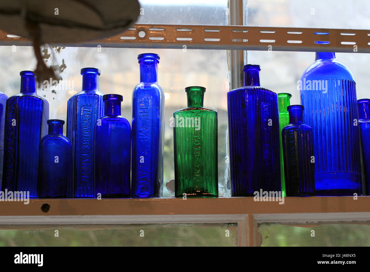 Cobalt Blue Poison Bottle High Resolution Stock Photography and Images ...