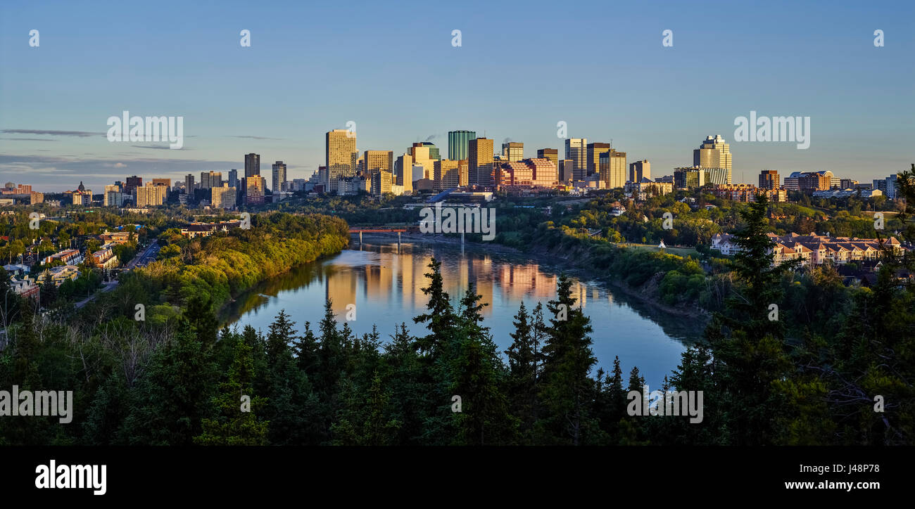 Skyline of downtown Edmonton reflected in the North Saskatchewan River ...