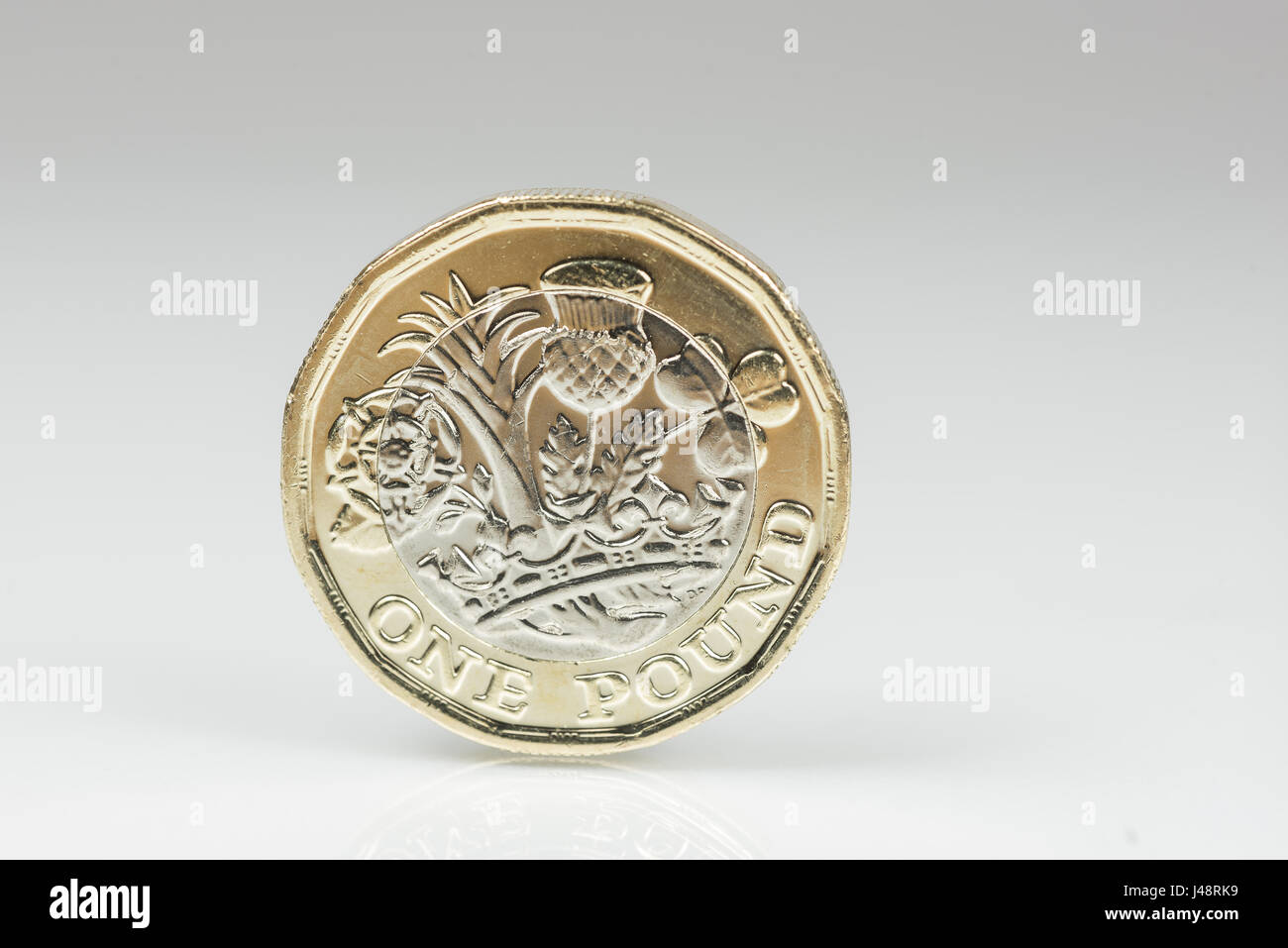 New British one pound sterling coin up close macro studio shot against ...