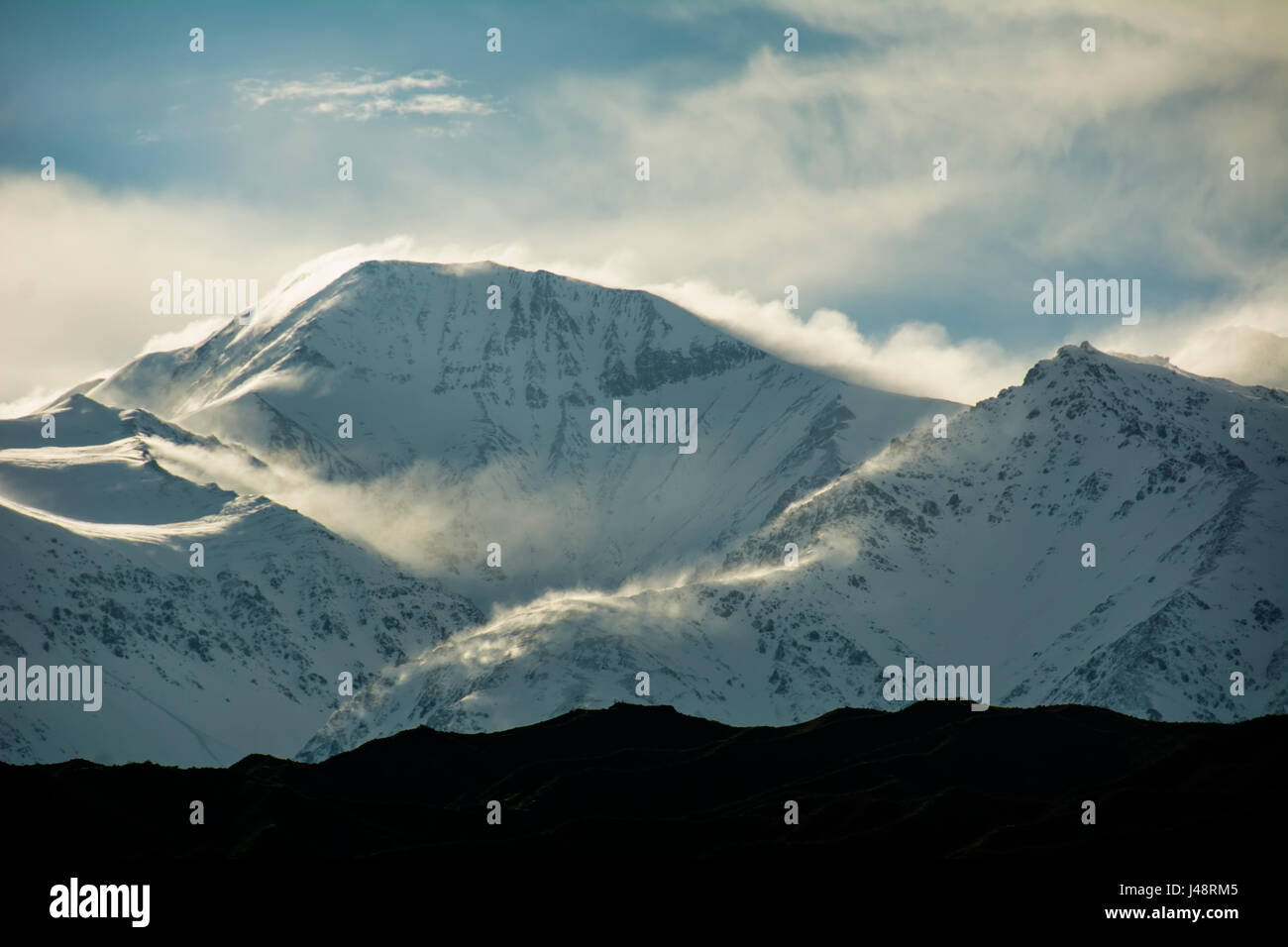 Mountain in the Andes covered with a layer of fresh snow; Mendoza ...