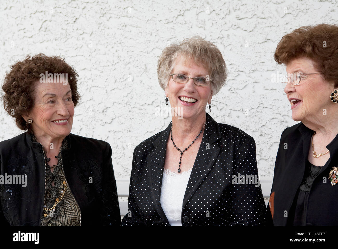 Three Women Talking Together; Edmonton, Alberta, Canada Stock Photo - Alamy