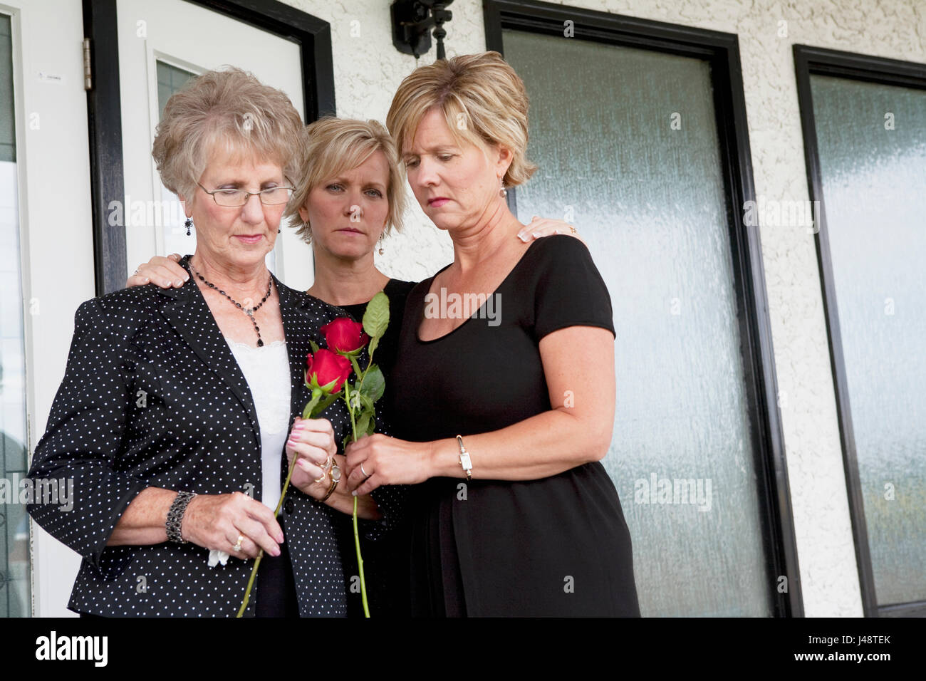 Two grieving women hi-res stock photography and images - Alamy