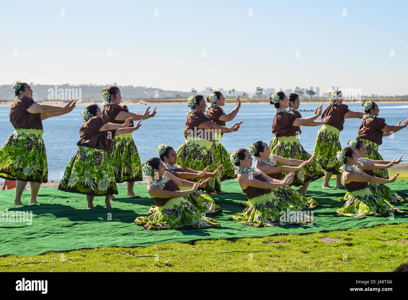 Hawaiian dancers performing by the bay Stock Photo - Alamy