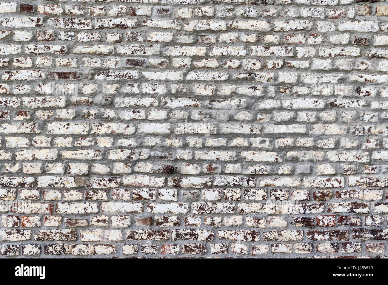 White painted red brick wall background wide shot Stock Photo - Alamy