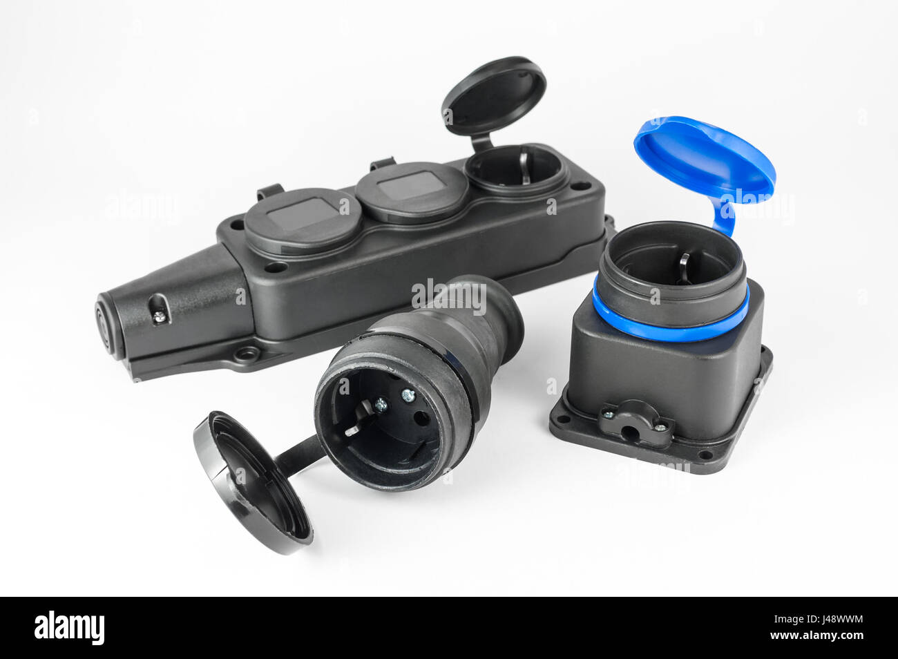 Variety of electric power plugs and sockets isolated on white ...