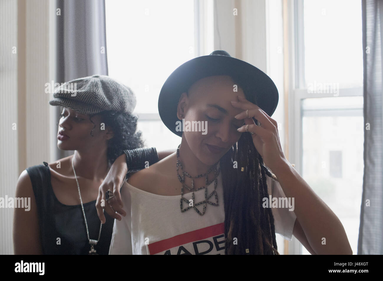 Two stylish young women Stock Photo - Alamy