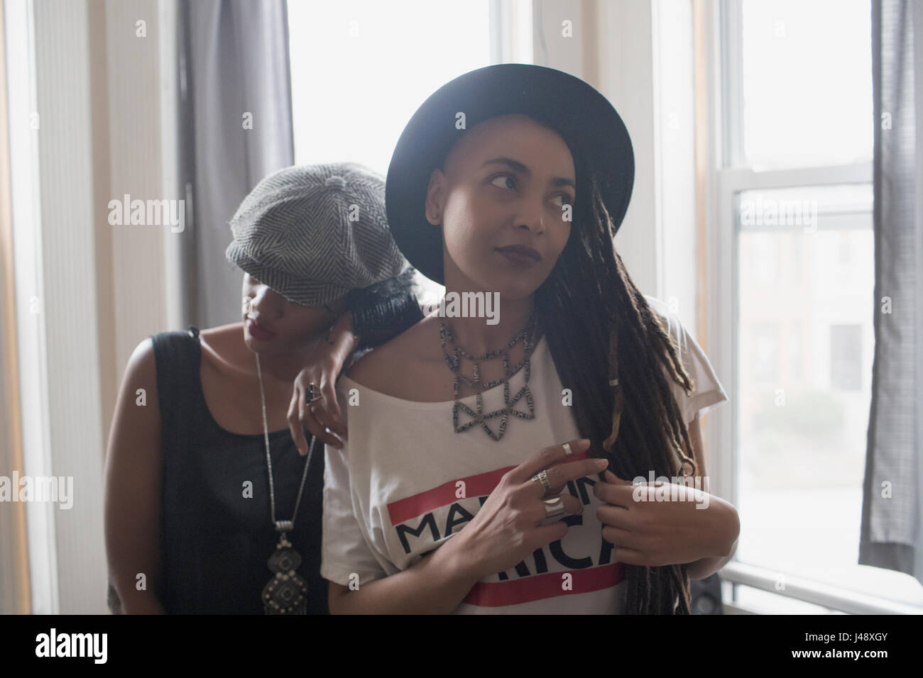 Two stylish young women Stock Photo - Alamy