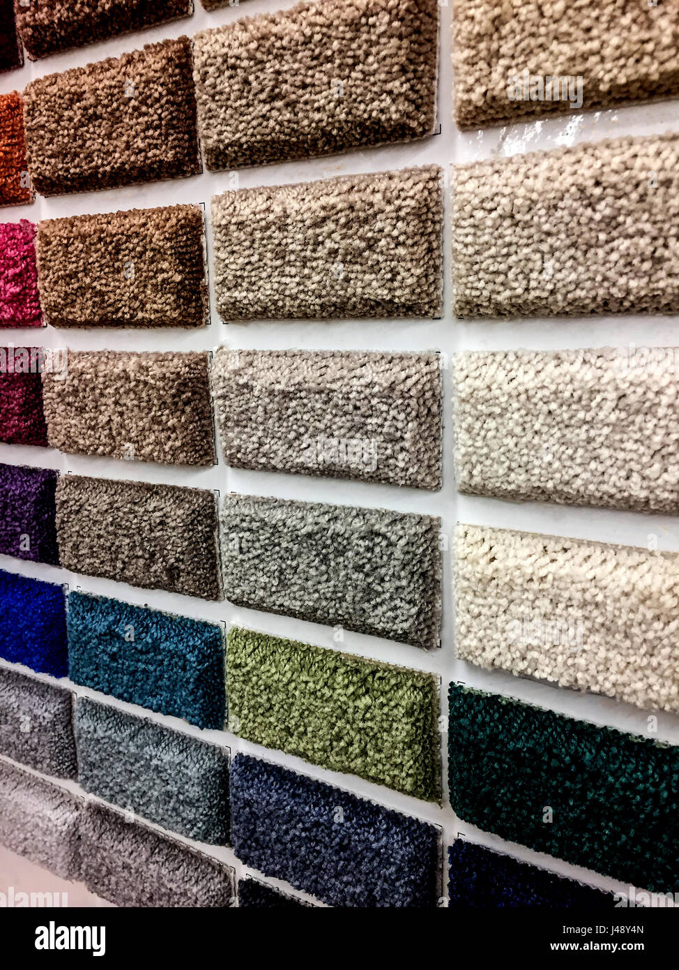 Various carpet samples for home remodel project Stock Photo - Alamy