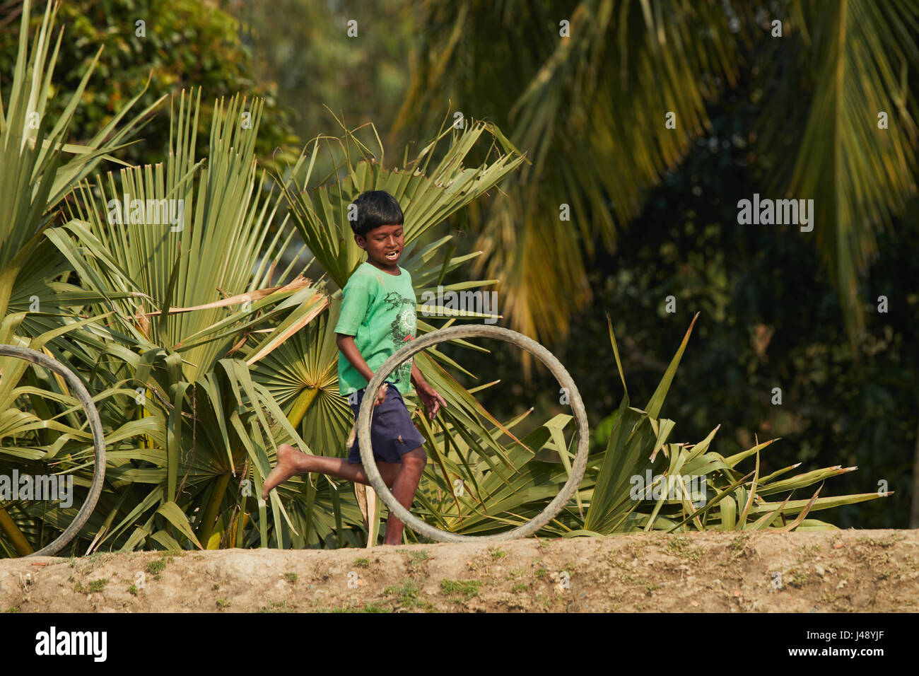 village boy running with joy in the Sundarbans Jungle National Park in ...