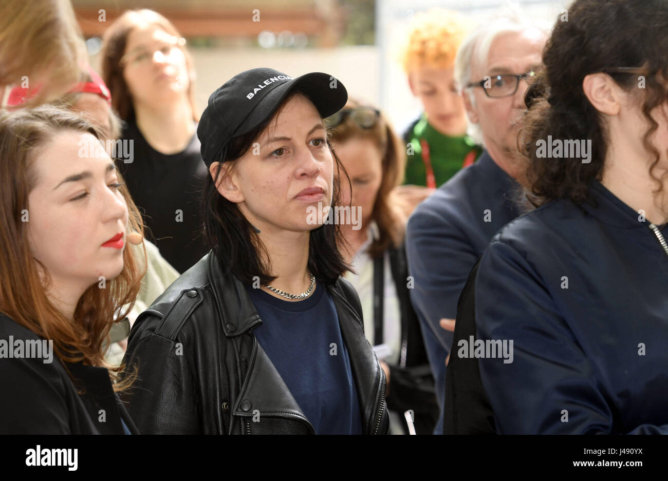 Venice, Italy. 10th May, 2017. Artist Anne Imhof (c), photographed ...