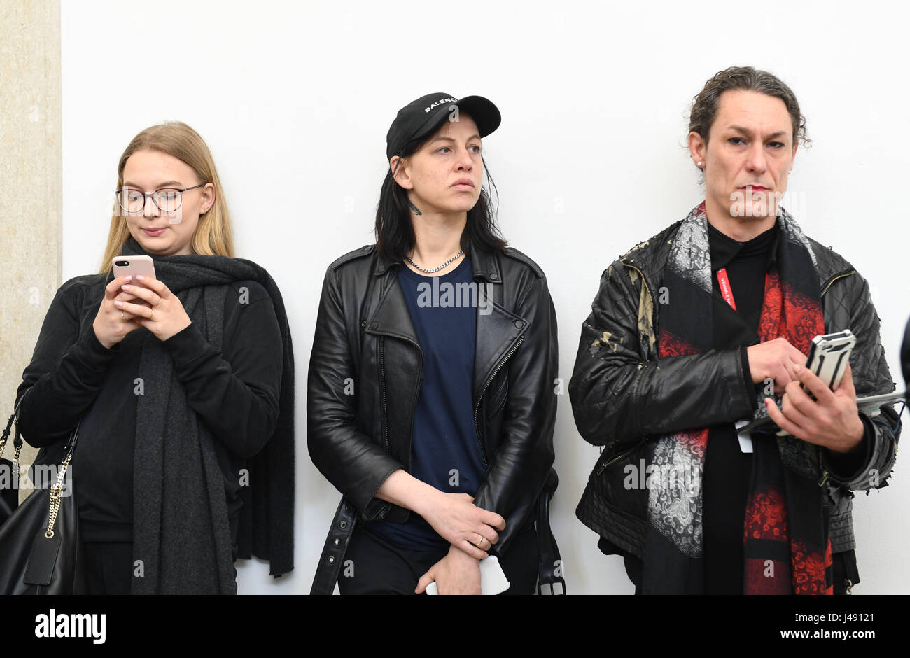 Venice, Italy. 10th May, 2017. Artist Anne Imhof (c), photographed ...