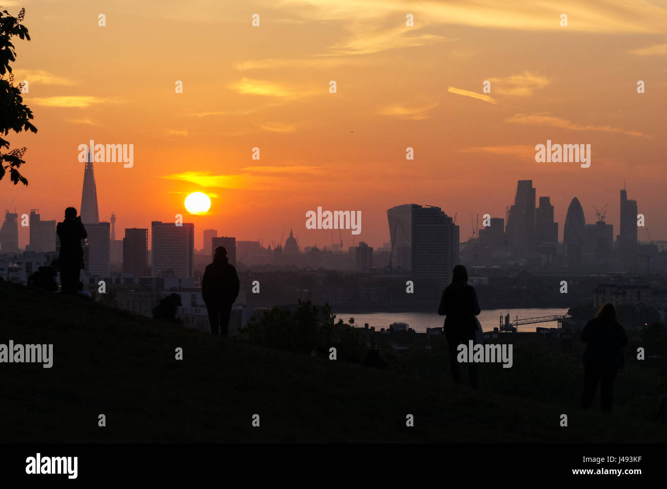 People watching sunset at Greenwich Park in London, England, United ...