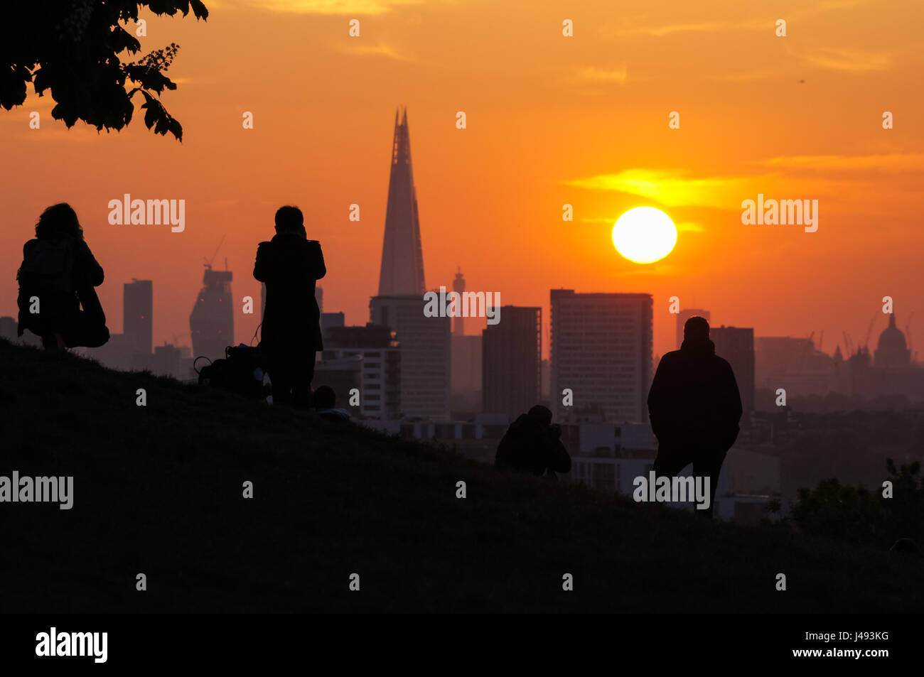 People watching sunset at Greenwich Park in London, England, United ...