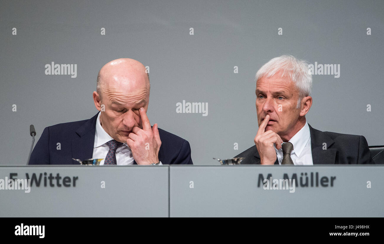 Volkswagen's CFO Frank Witter (L), and Matthias Mueller, the CEO of ...