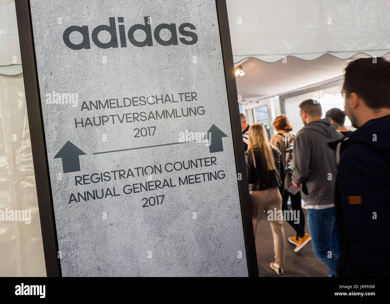 Fuerth, Germany. 11th May, 2017. Shareholders arrive for the Adidas ...