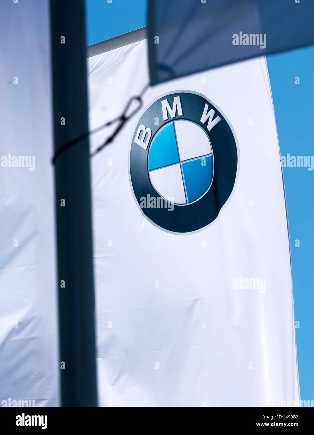 Munich, Germany. 11th May, 2017. A flag featuring the corporate logo of ...