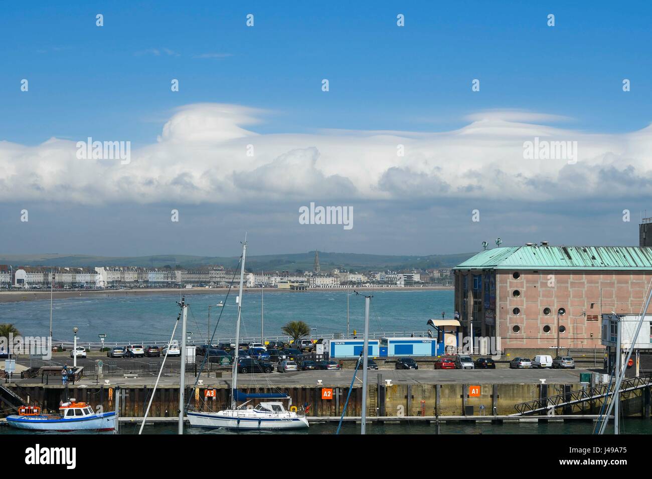 Weymouth, Dorset, UK. 11th May, 2017. UK Weather. Unusual cloud ...