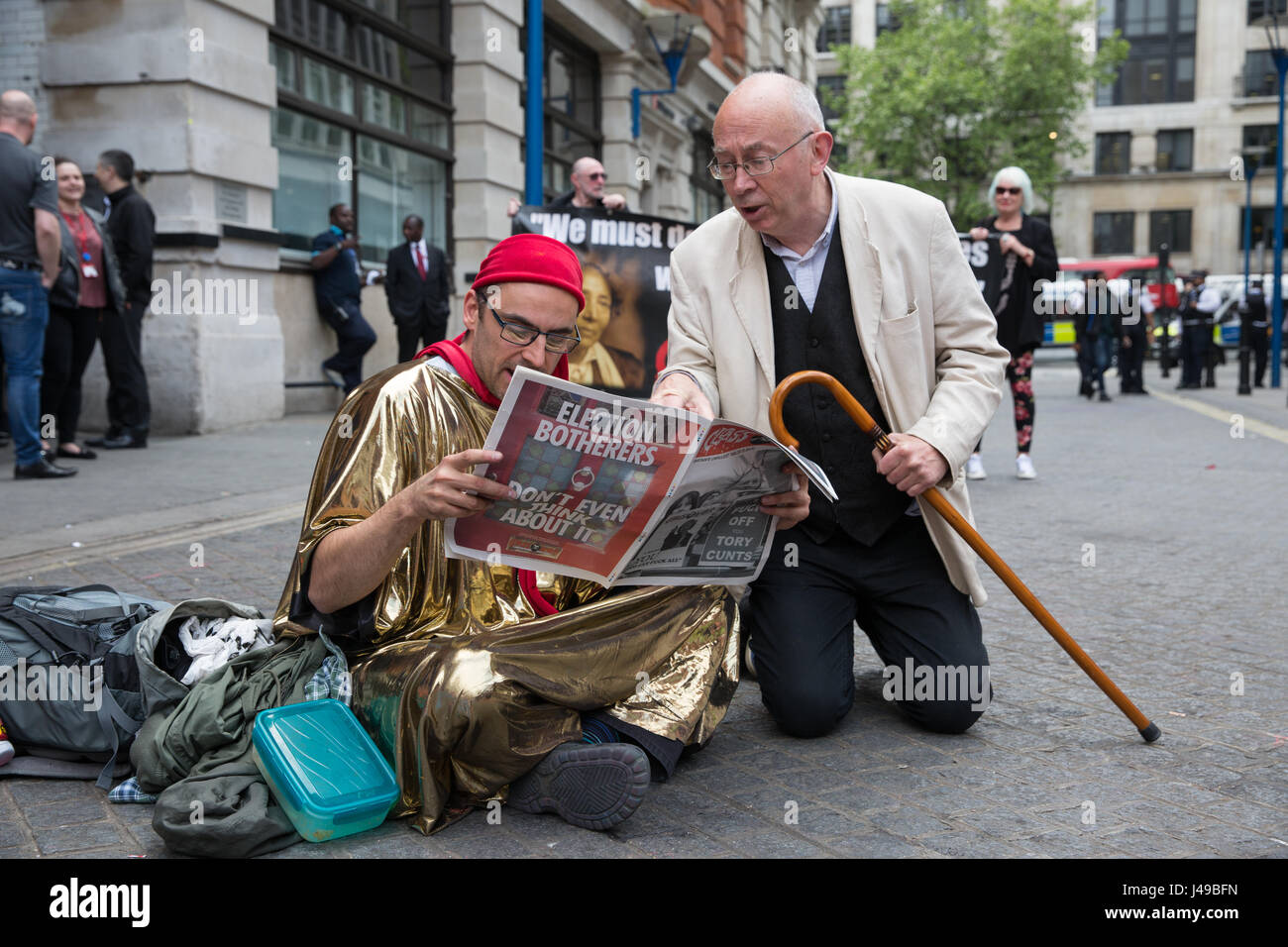 London, UK. 11th May, 2017. Ian Bone (r) of Class War talks to a Life ...