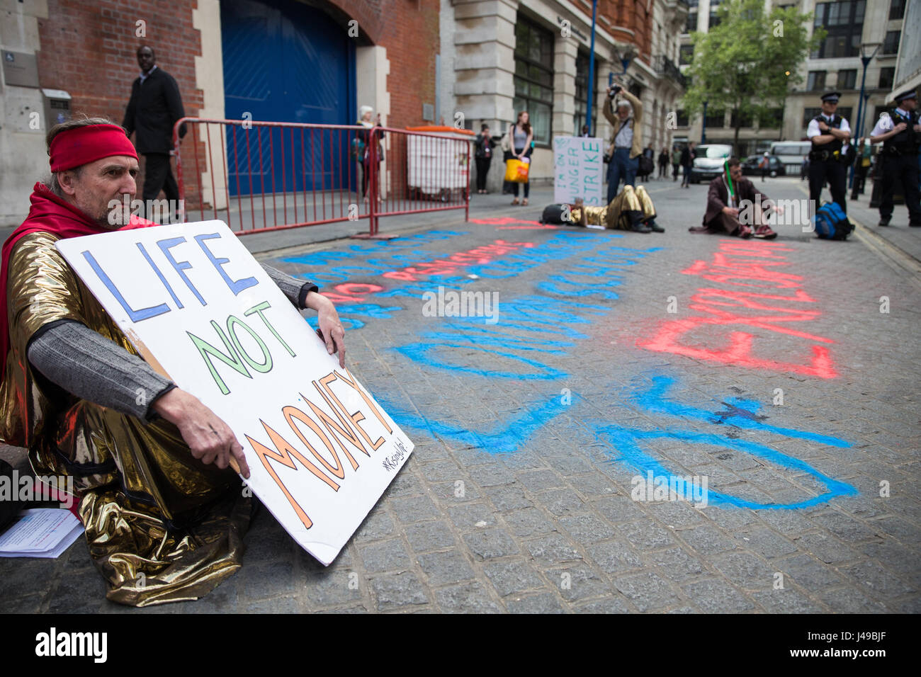 London, UK. 11th May, 2017. 'Life Not Money' activist and divestment ...