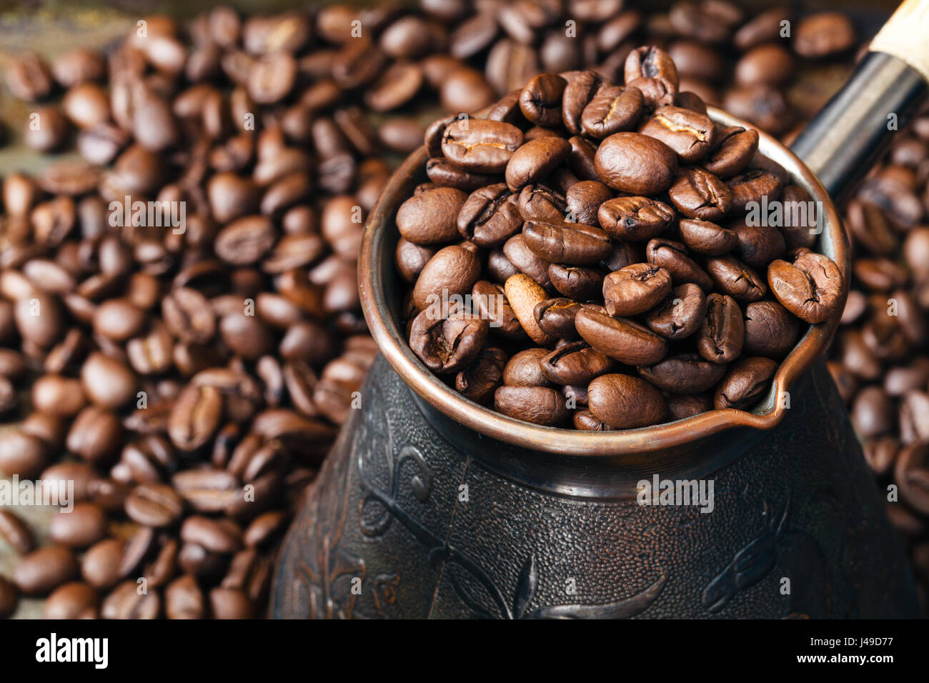 Copper coffee pot for preparation of coffee on scattered coffee grains ...