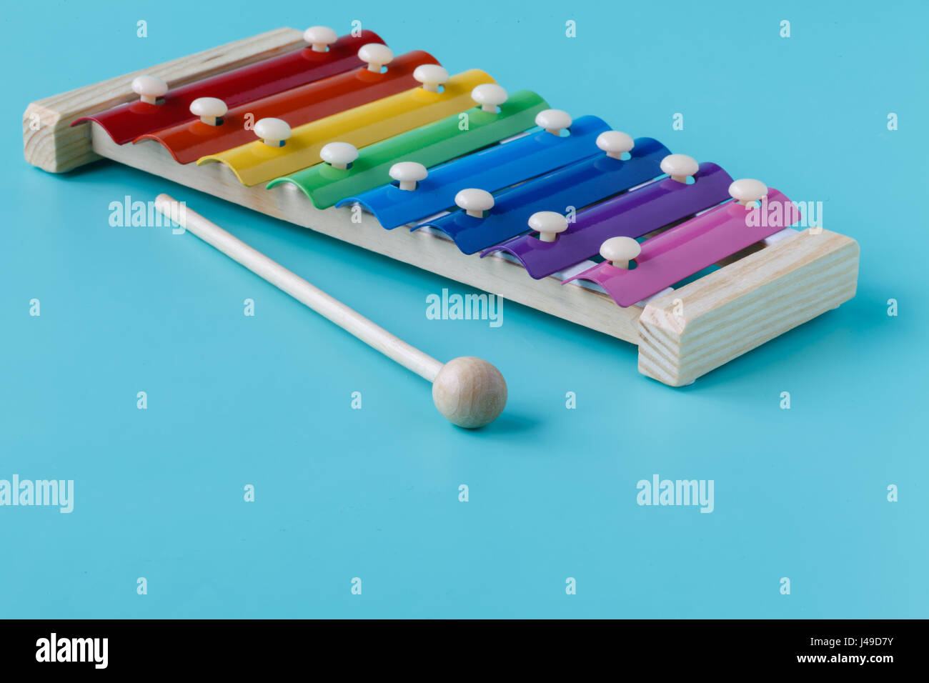 Wooden toy xylophone in rainbow colors. Educational toy for kids and ...
