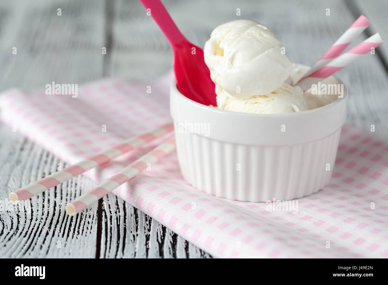 Vanilla ice-cream on white background Stock Photo - Alamy