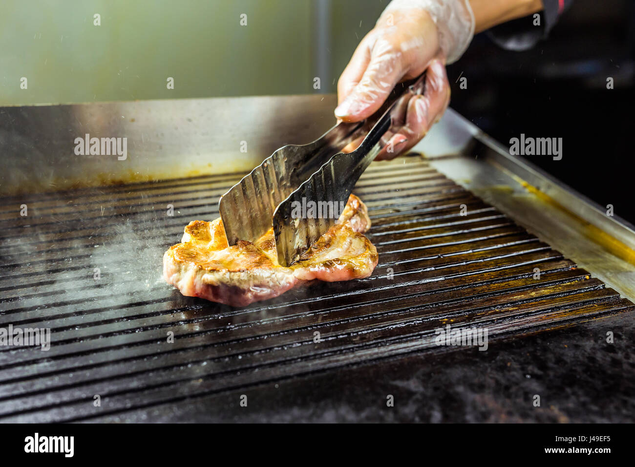 closeup of a steak on grill Stock Photo - Alamy