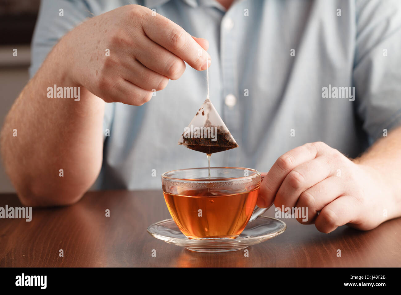 Dipping hands in water hi-res stock photography and images - Alamy