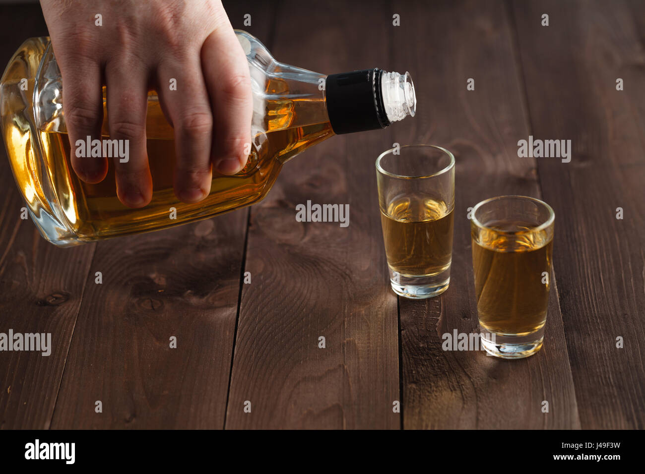 Strong alcohol pouring shot hi-res stock photography and images - Alamy