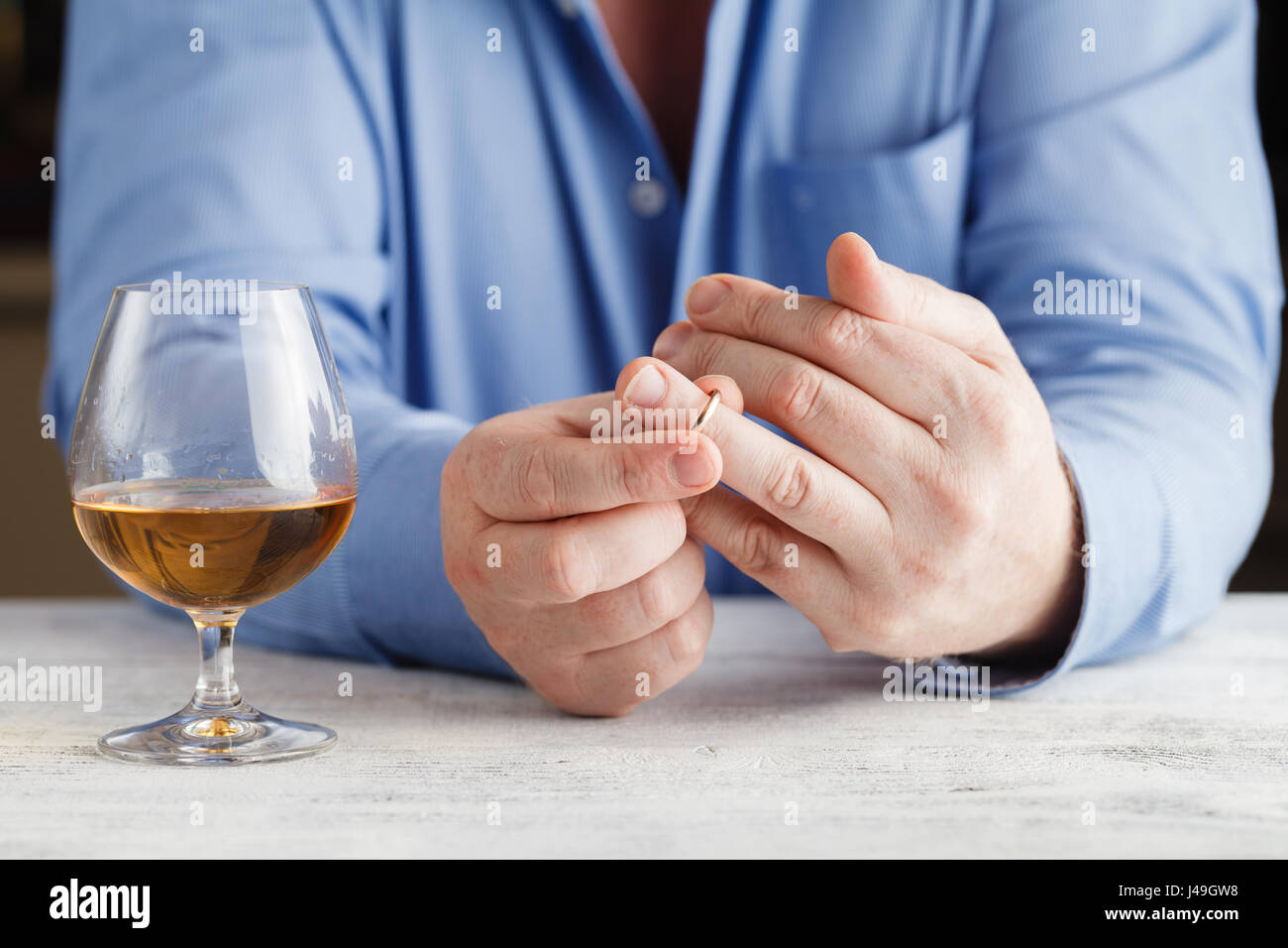 Wedding ring finger take off hi-res stock photography and images - Alamy