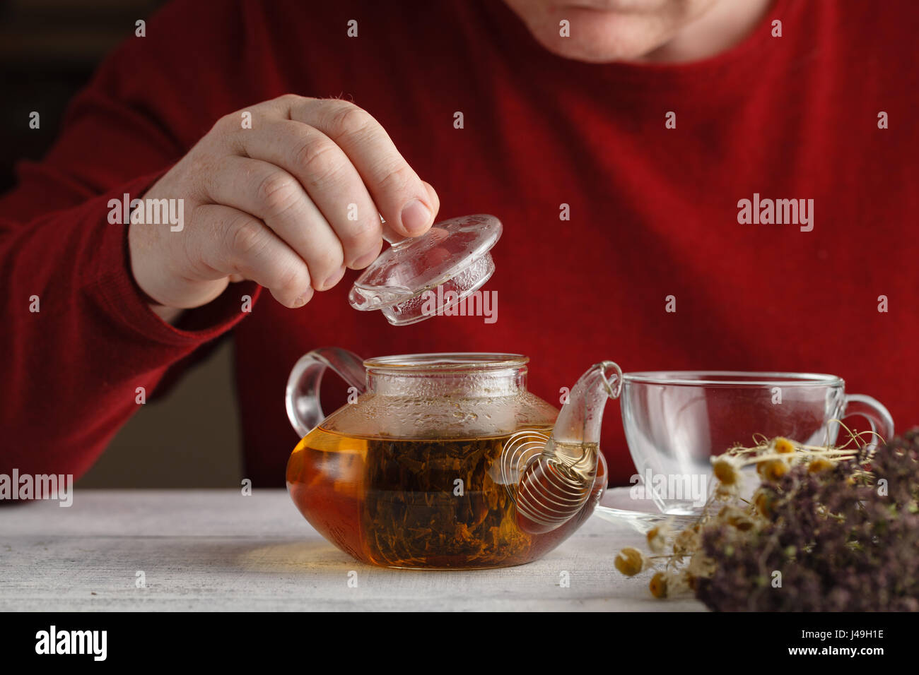 Pouring Herbal Tea Stock Photo - Alamy