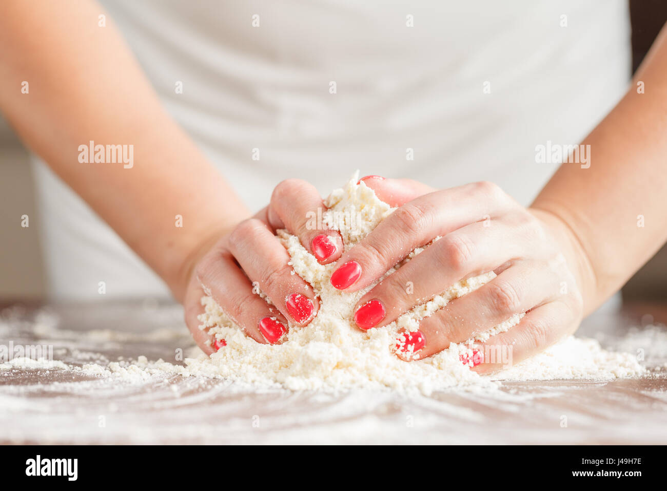 Womans baker hands making biscuits hi-res stock photography and images ...