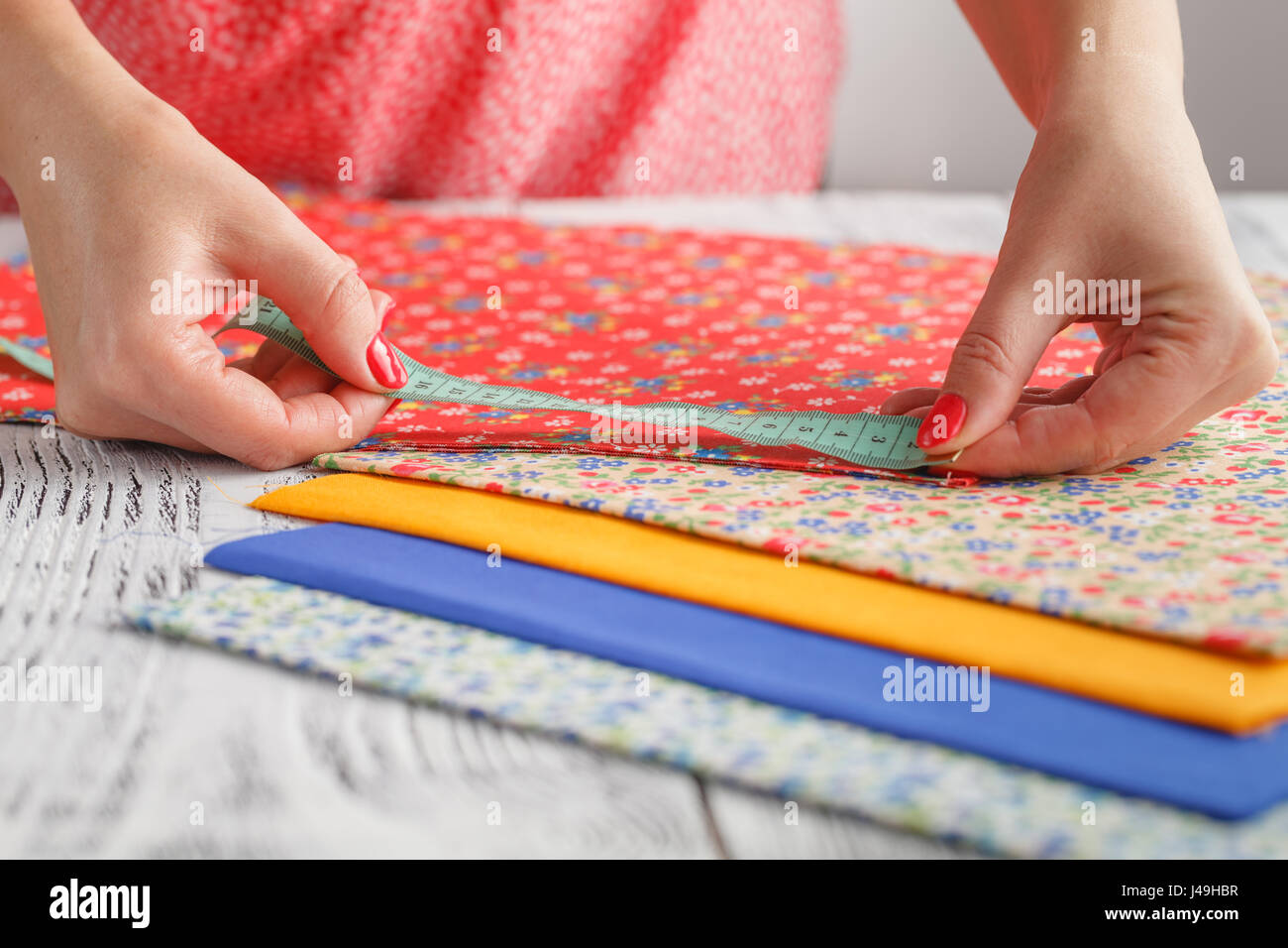 Woman working with scraps of colored tissue and palette close up Stock ...