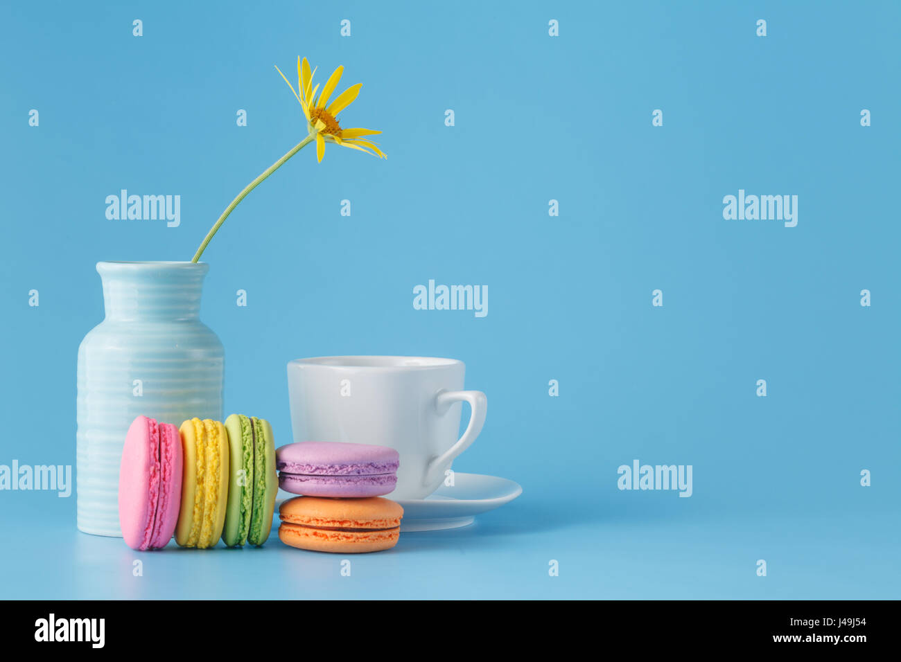 French colorful macaroon with flower Stock Photo - Alamy